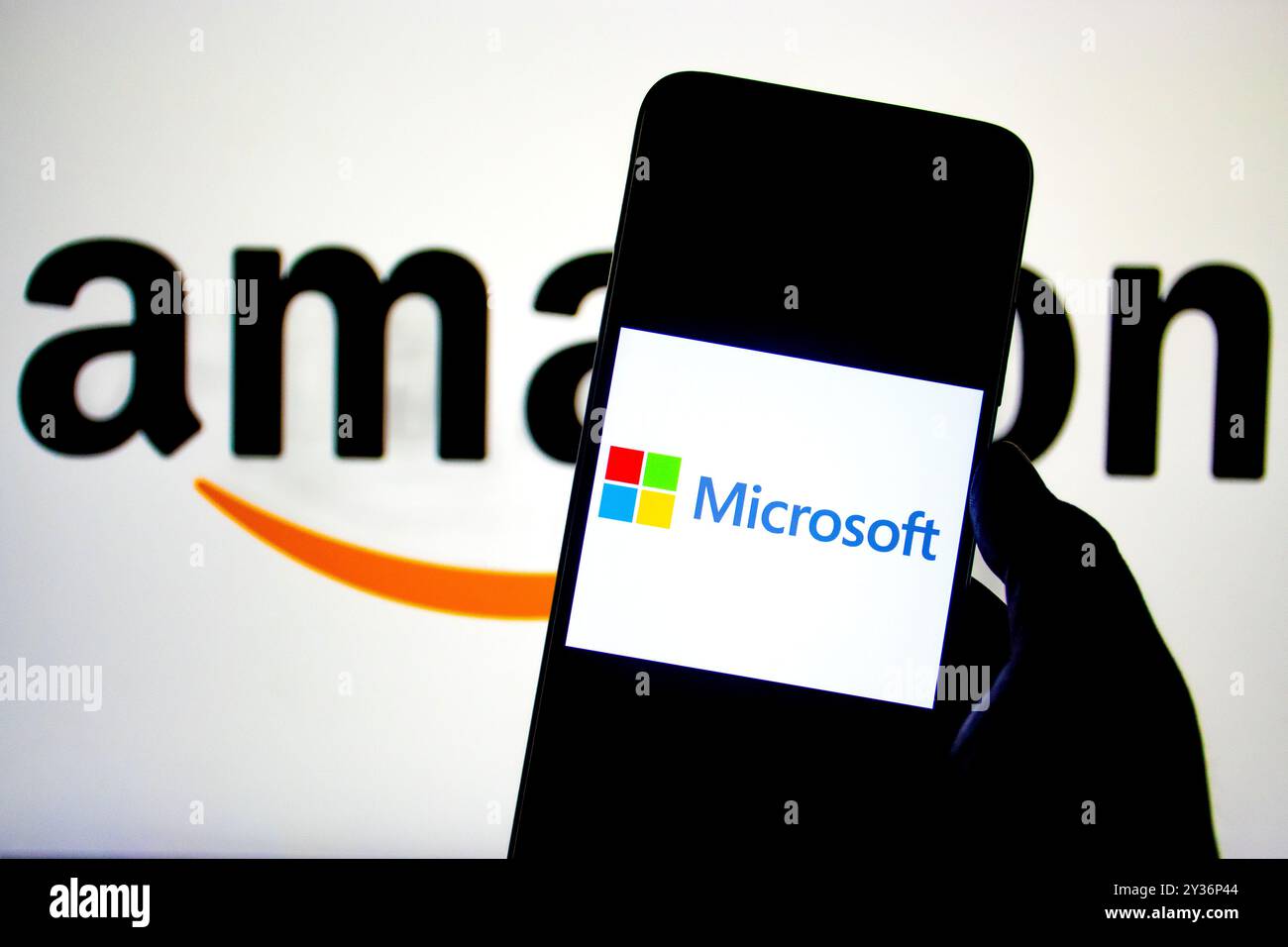 In this photo illustration, a Microsoft logo seen displayed on a ...