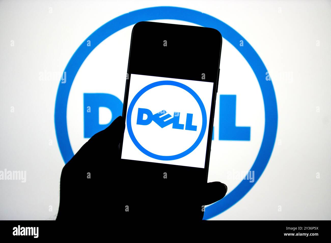 In this photo illustration, a Dell logo seen displayed on a smartphone ...