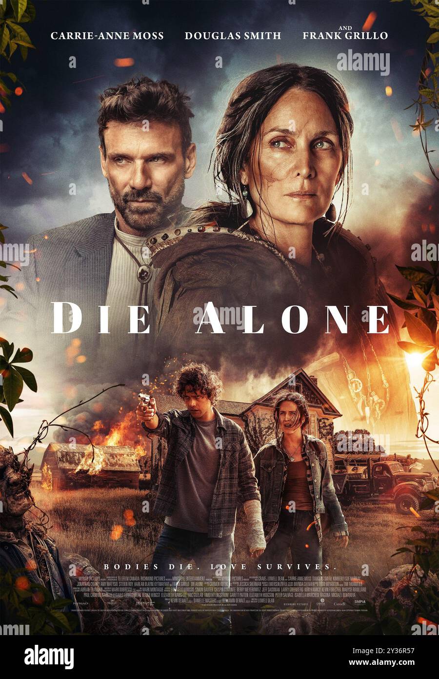 DIE ALONE, poster, top, from left: Frank Grillo, Carrie-Anne Moss ...