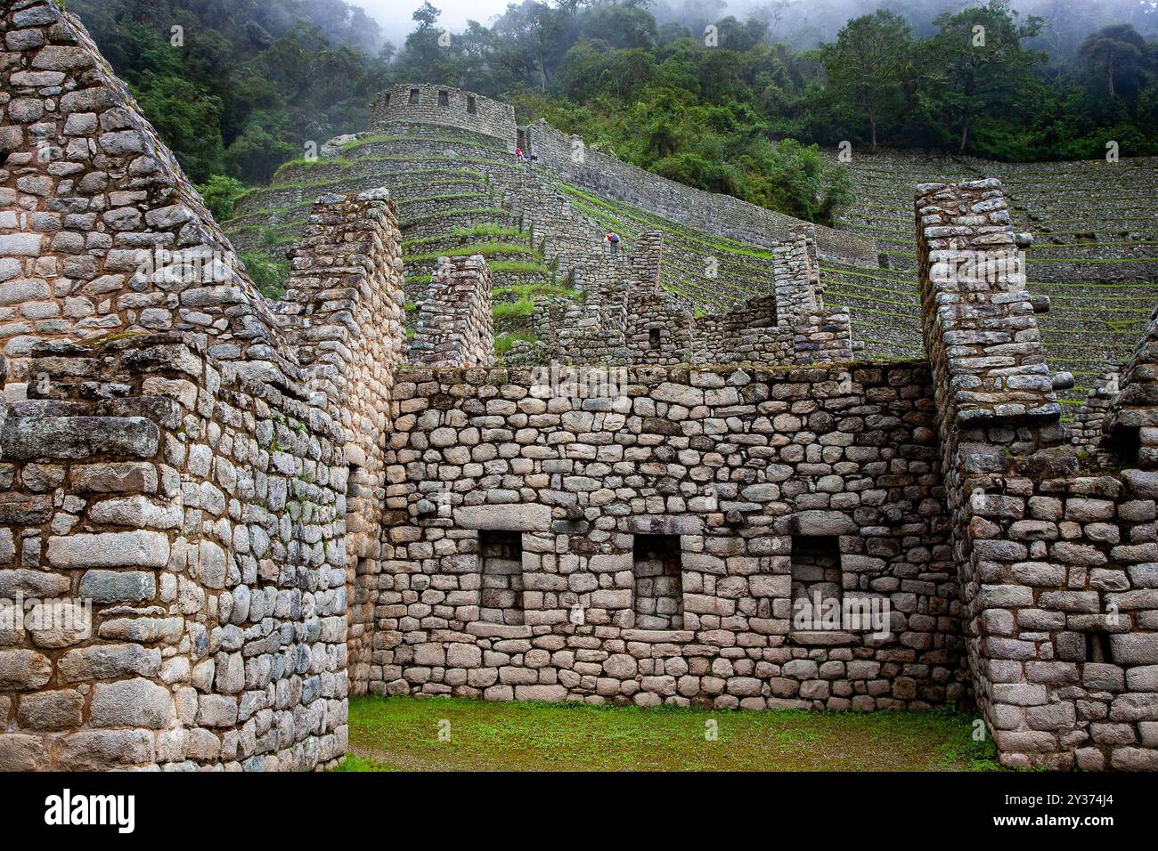 Hidden in the clouds, where ancient stone terraces blend with the ...