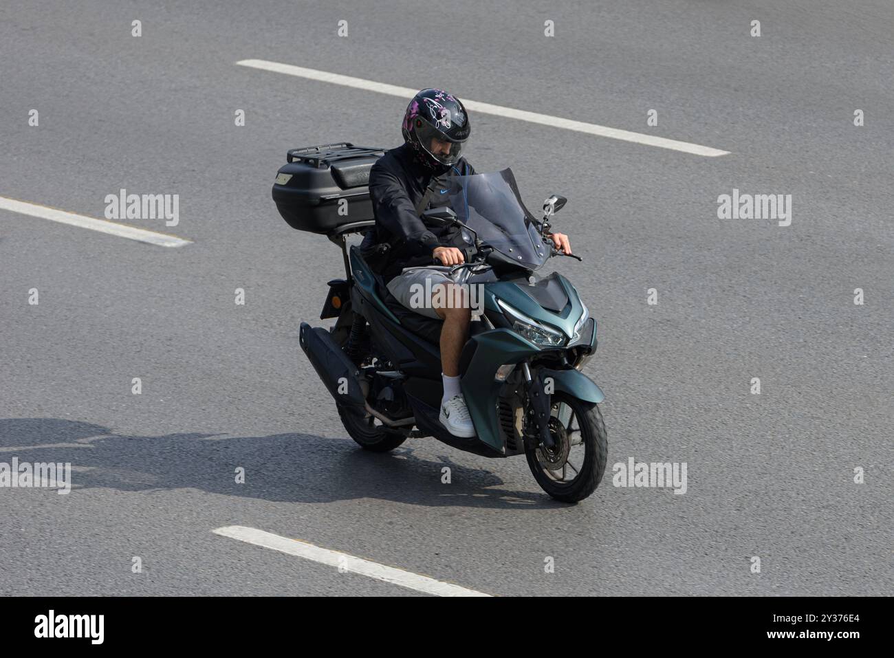 ISTANBUL, TURKEY - SEPTEMBER 7, 2024: Man from city riding motorcycle ...