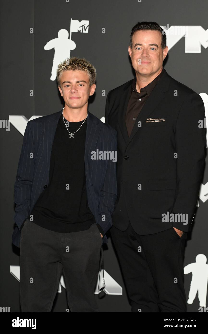 Elmont, USA. 12th Sep, 2024. Carson Daly and Jackson Daly attends the ...