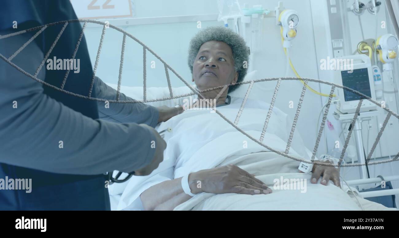 Image of dna strand over african american male doctor and senior female ...