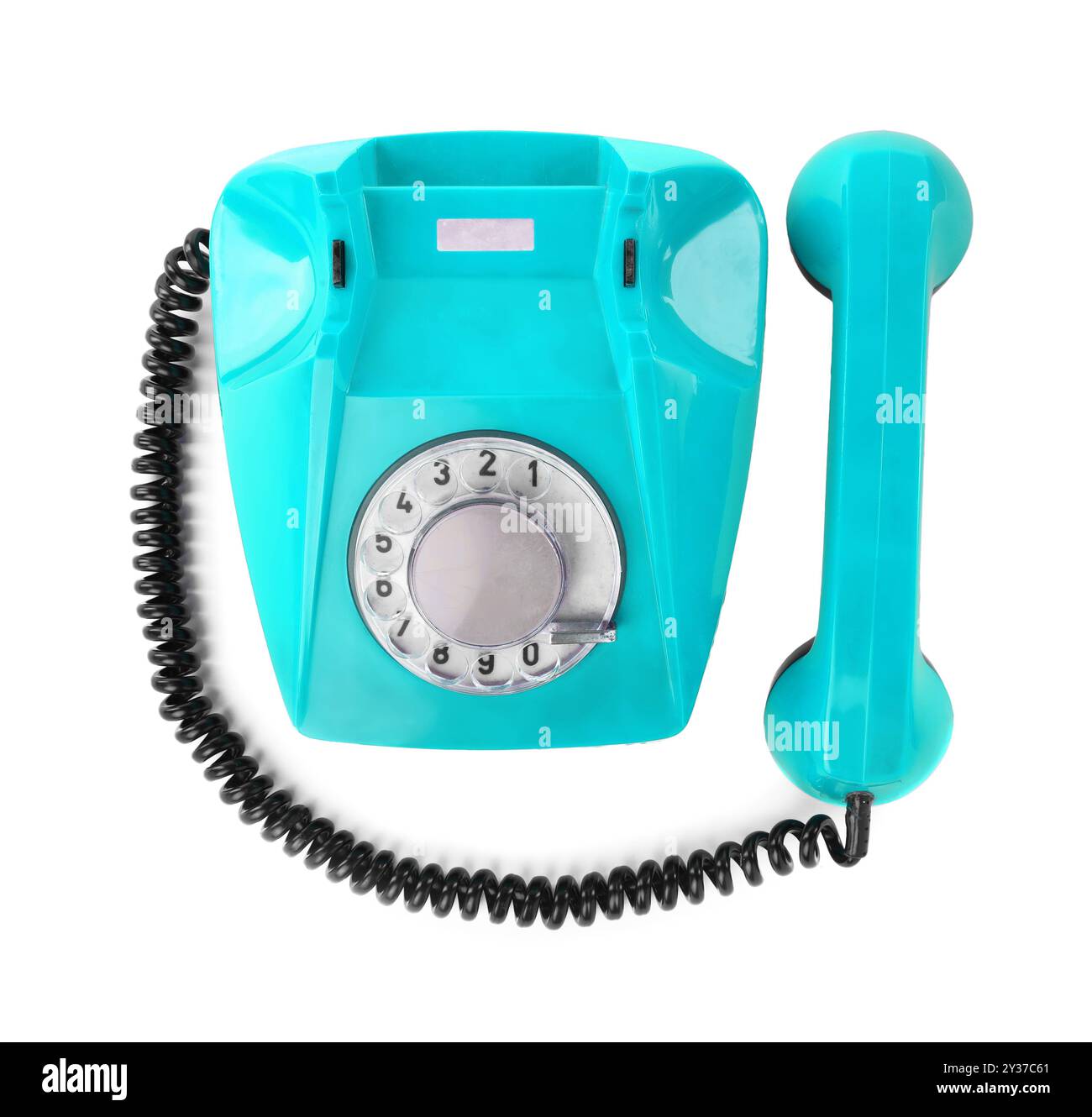 Old light blue telephone with rotary dial isolated on white, top view ...