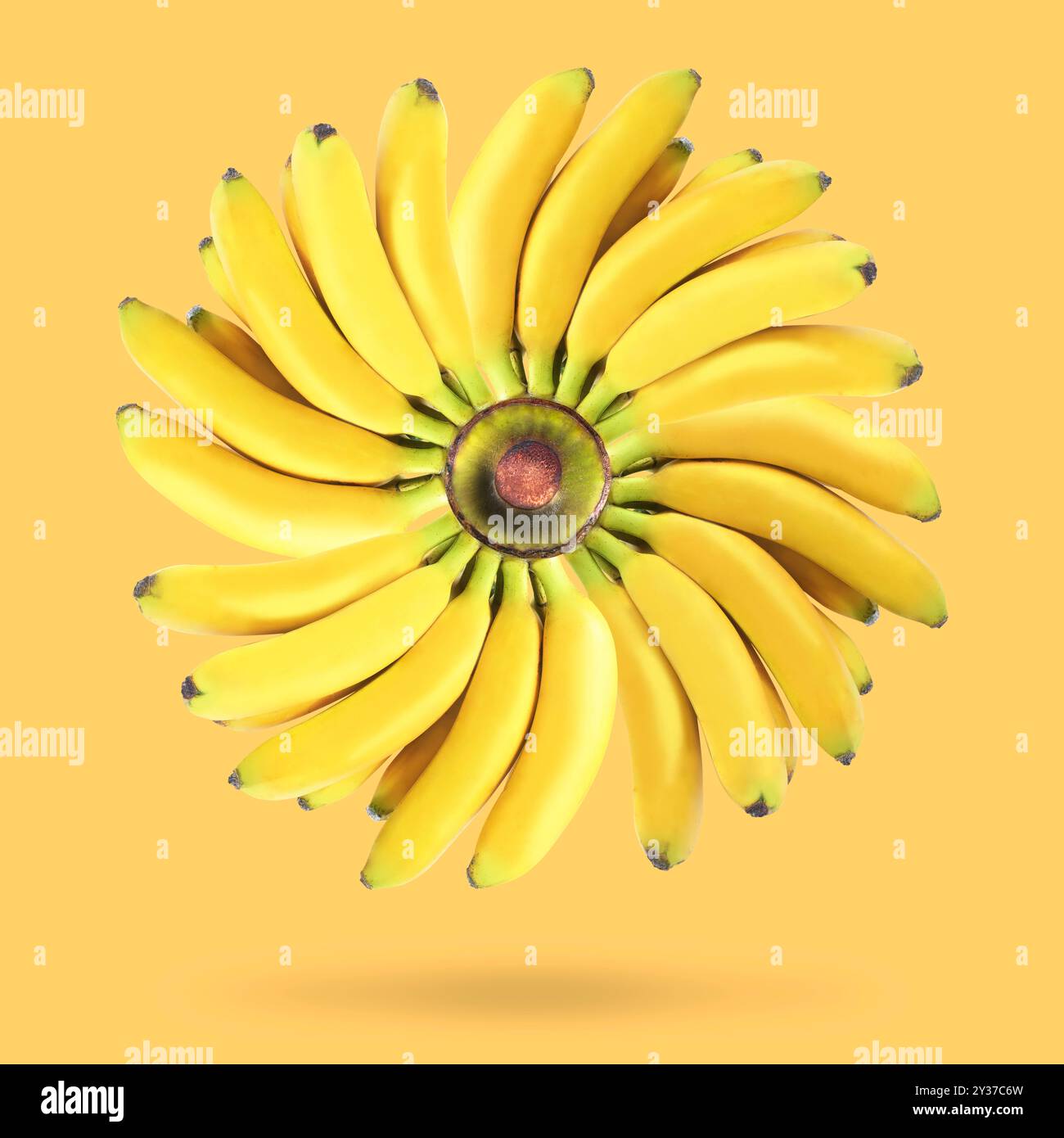 Bunch of delicious ripe bananas in air yellow background Stock Photo ...