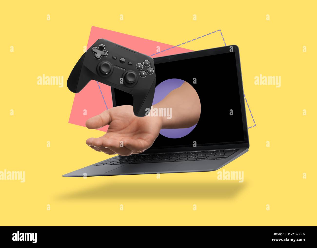 Man's hand sticking from laptop and catching gamepad on yellow ...