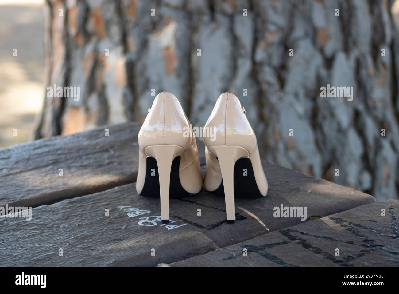 Shoes beneath tree hi-res stock photography and images - Alamy