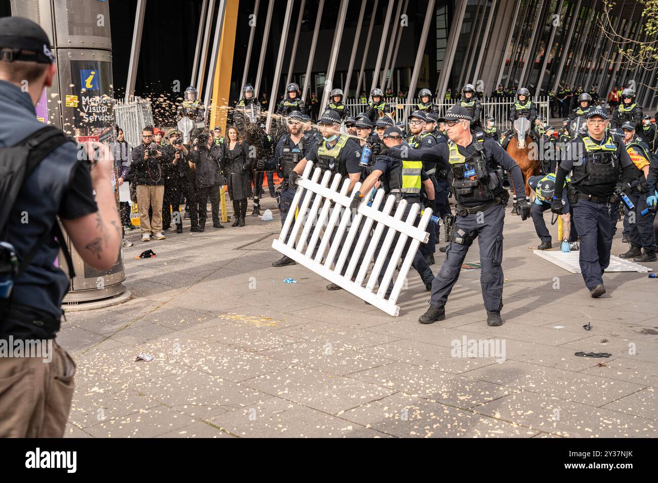 Police seen using pepper spray to disperse the crowd during the rally ...