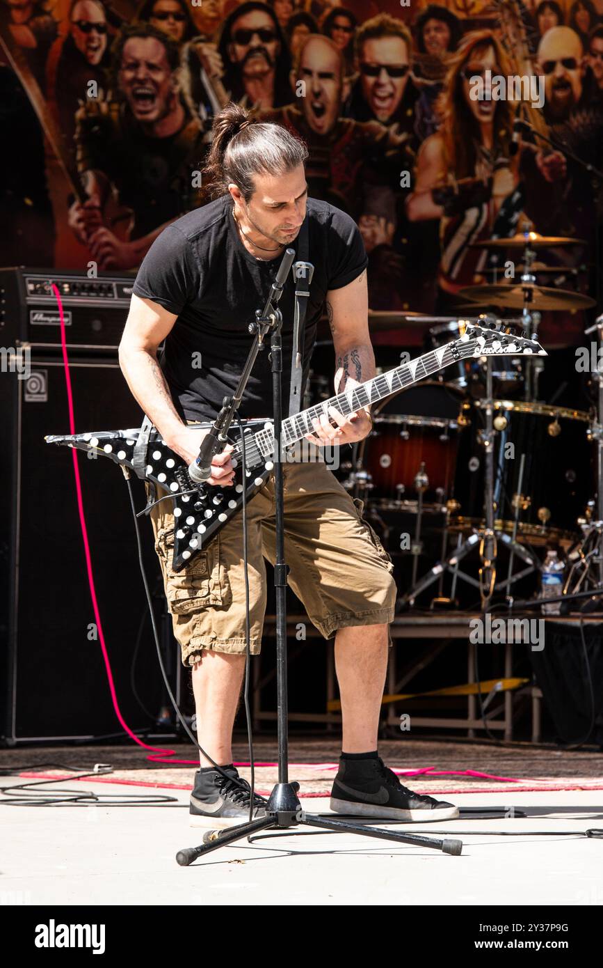 Brian Tichy, best known as a drummer, playing guitar at the Rock for ...