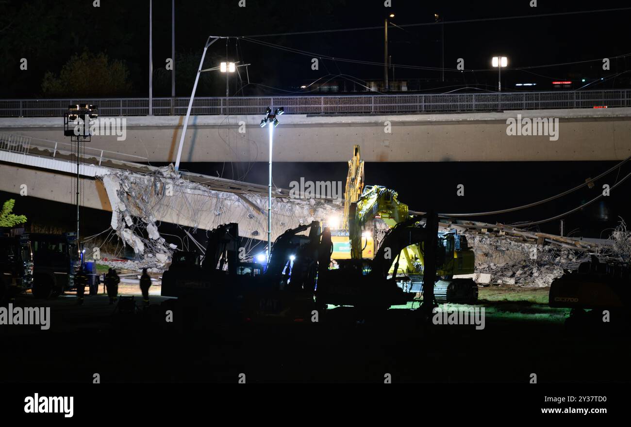 13 September 2024, Saxony, Dresden: Excavators are used to demolish ...