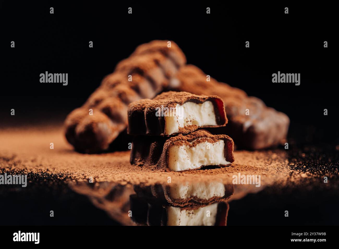 Chocolate bar with creamy filling on dark background, ideal for dessert ...