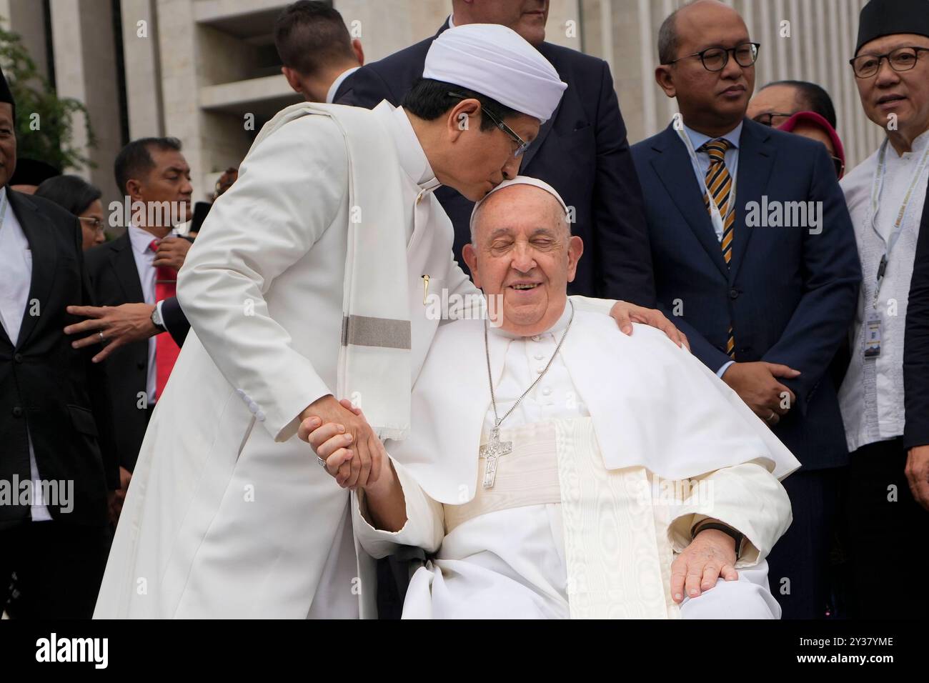 The Grand Imam Nasaruddin Umar, left, bids farewell to Pope Francis, as ...