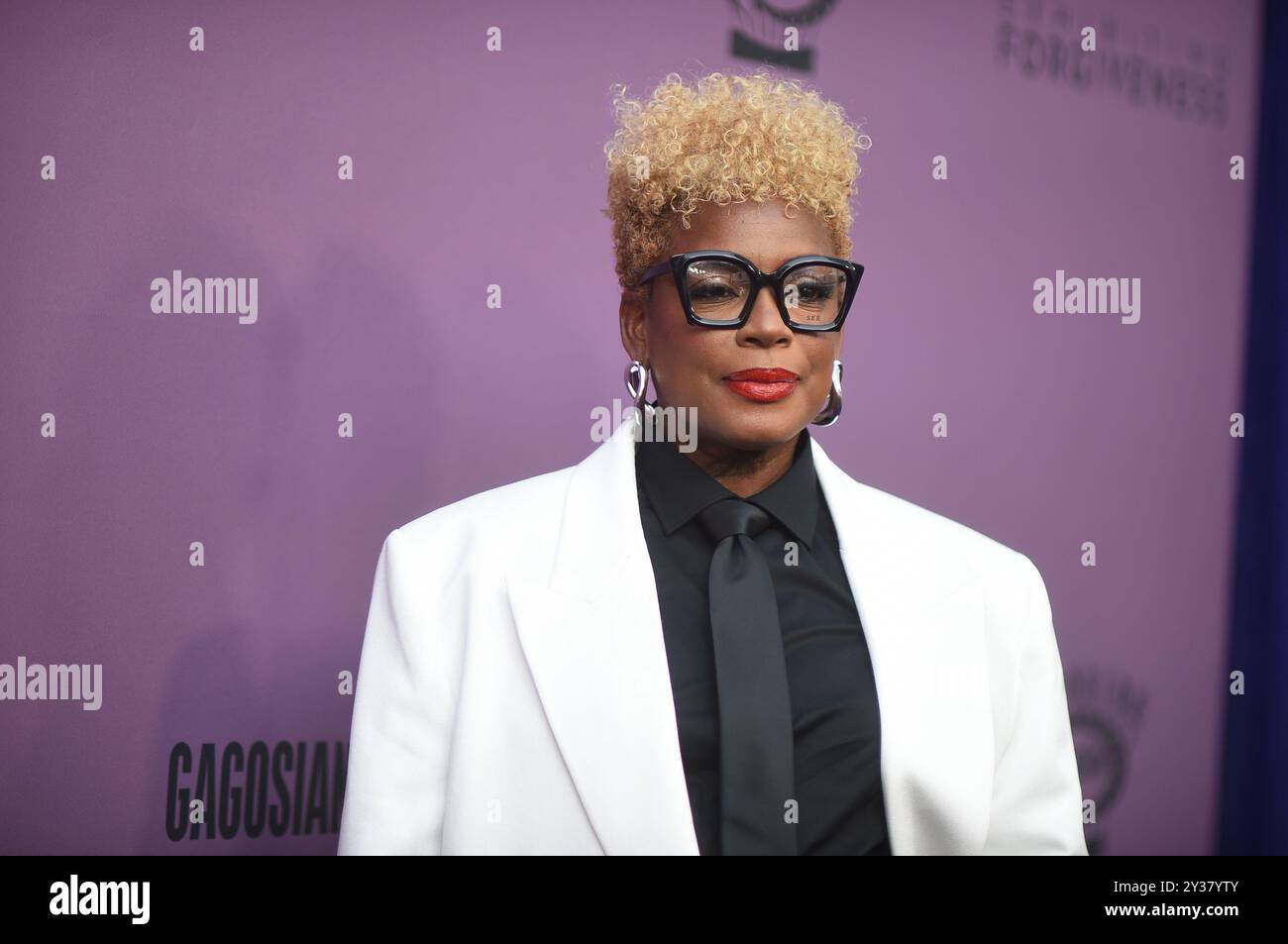 Aunjanue Ellis-Taylor arrives at the premiere of "Exhibiting ...