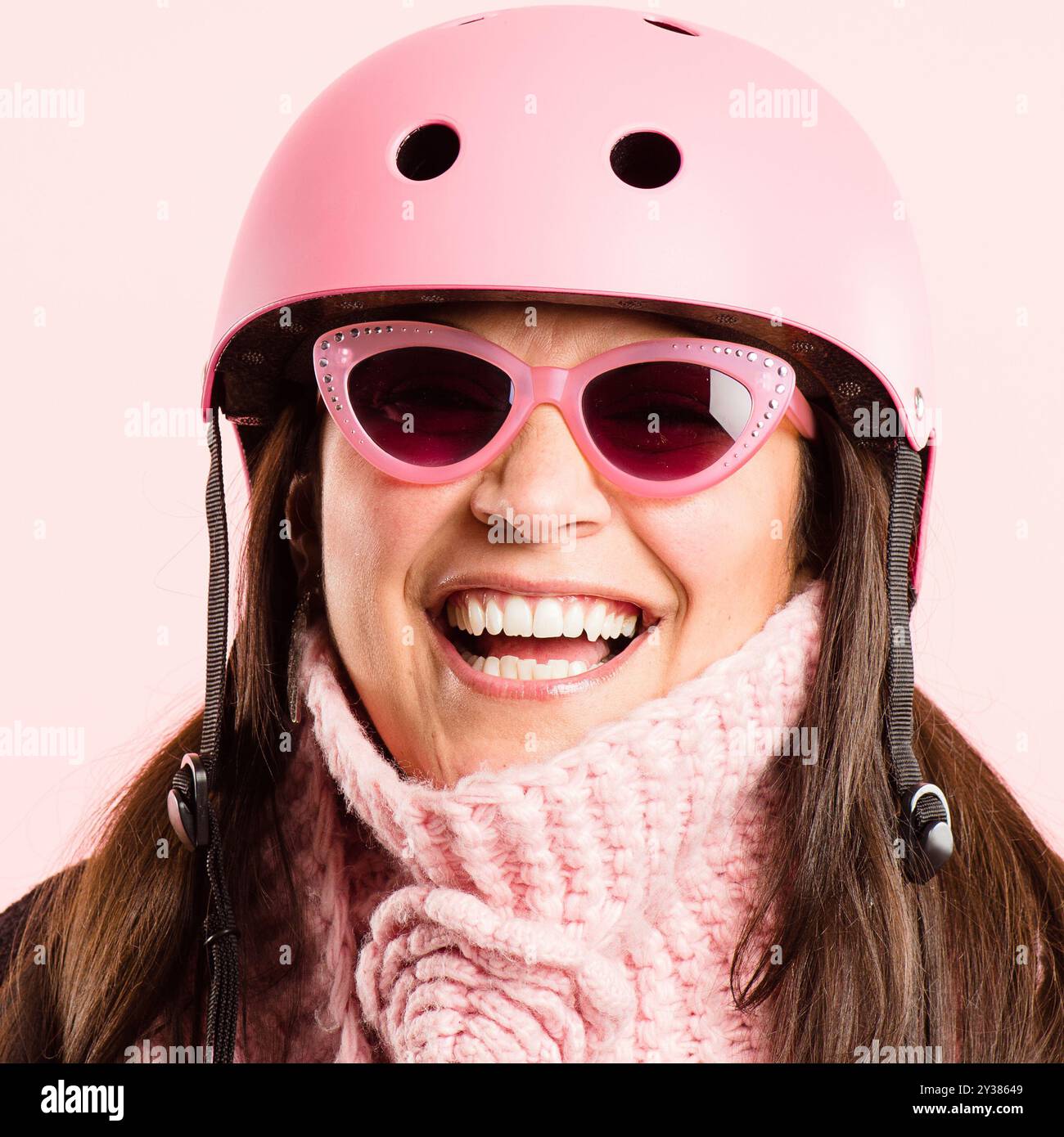 Studio, happy woman and portrait with helmet for protection, safety and ...