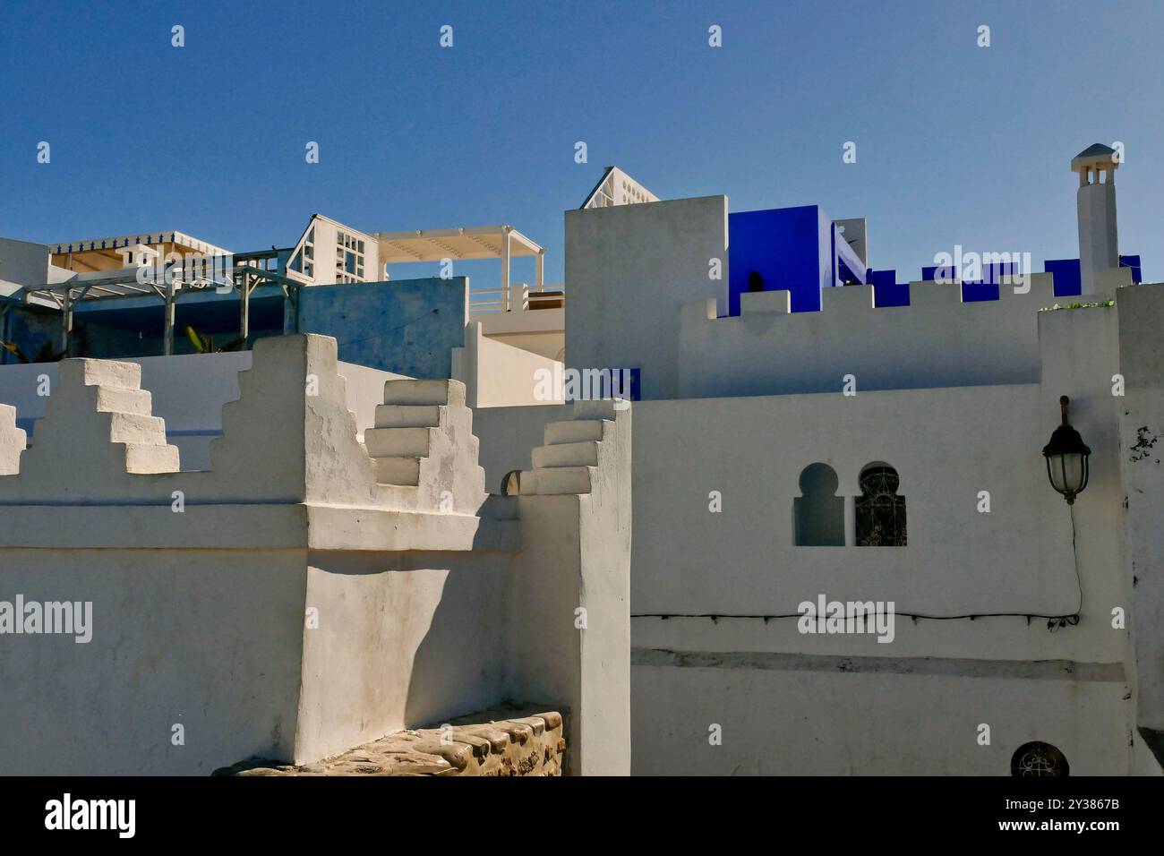 the fortified city of Asilah, on the northwestern tip of Morocco, 42 ...