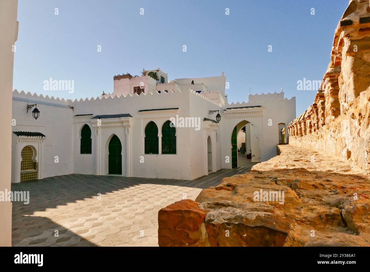 the fortified city of Asilah, on the northwestern tip of Morocco, 42 ...