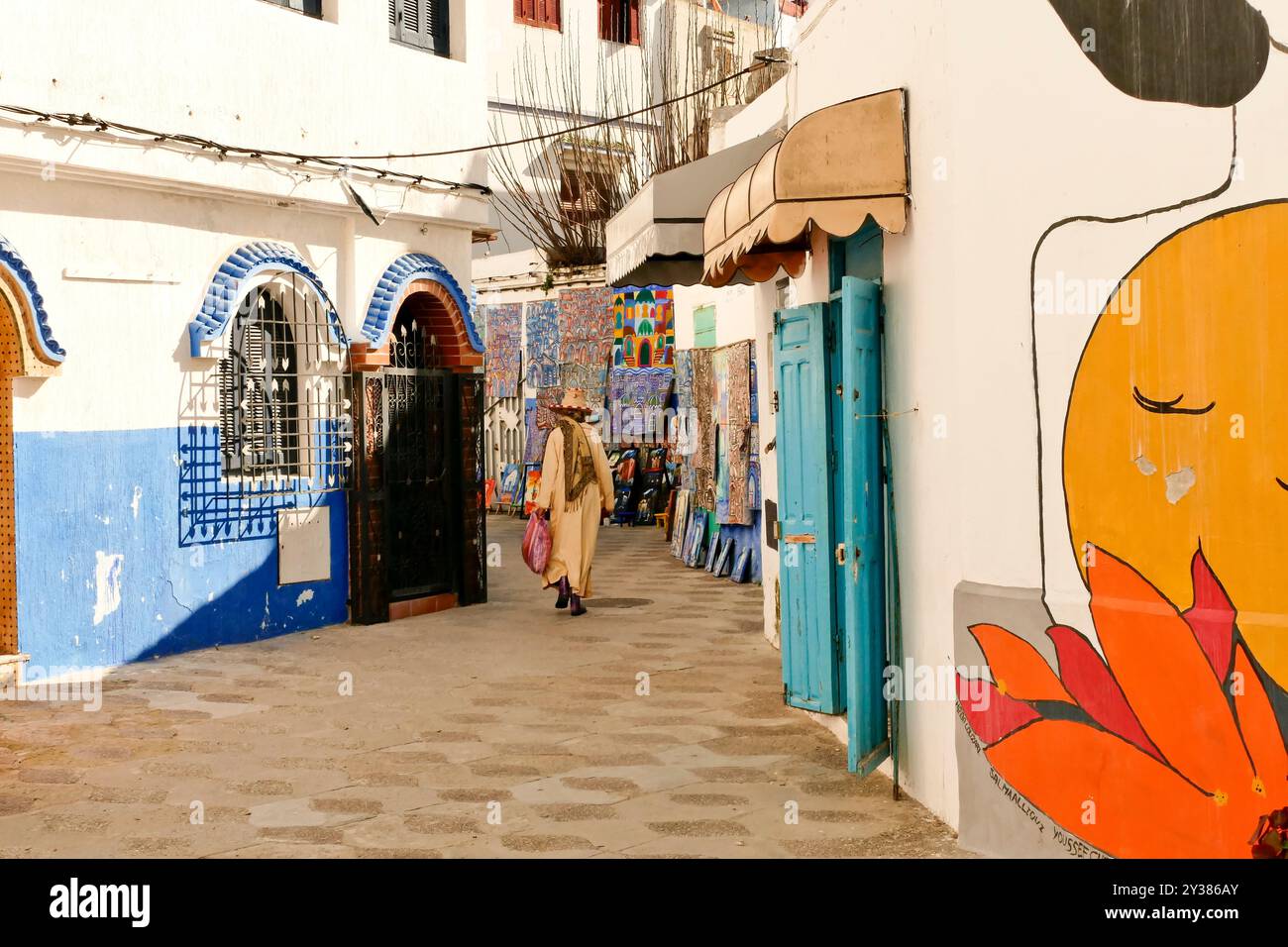 the fortified city of Asilah, on the northwestern tip of Morocco, 42 ...