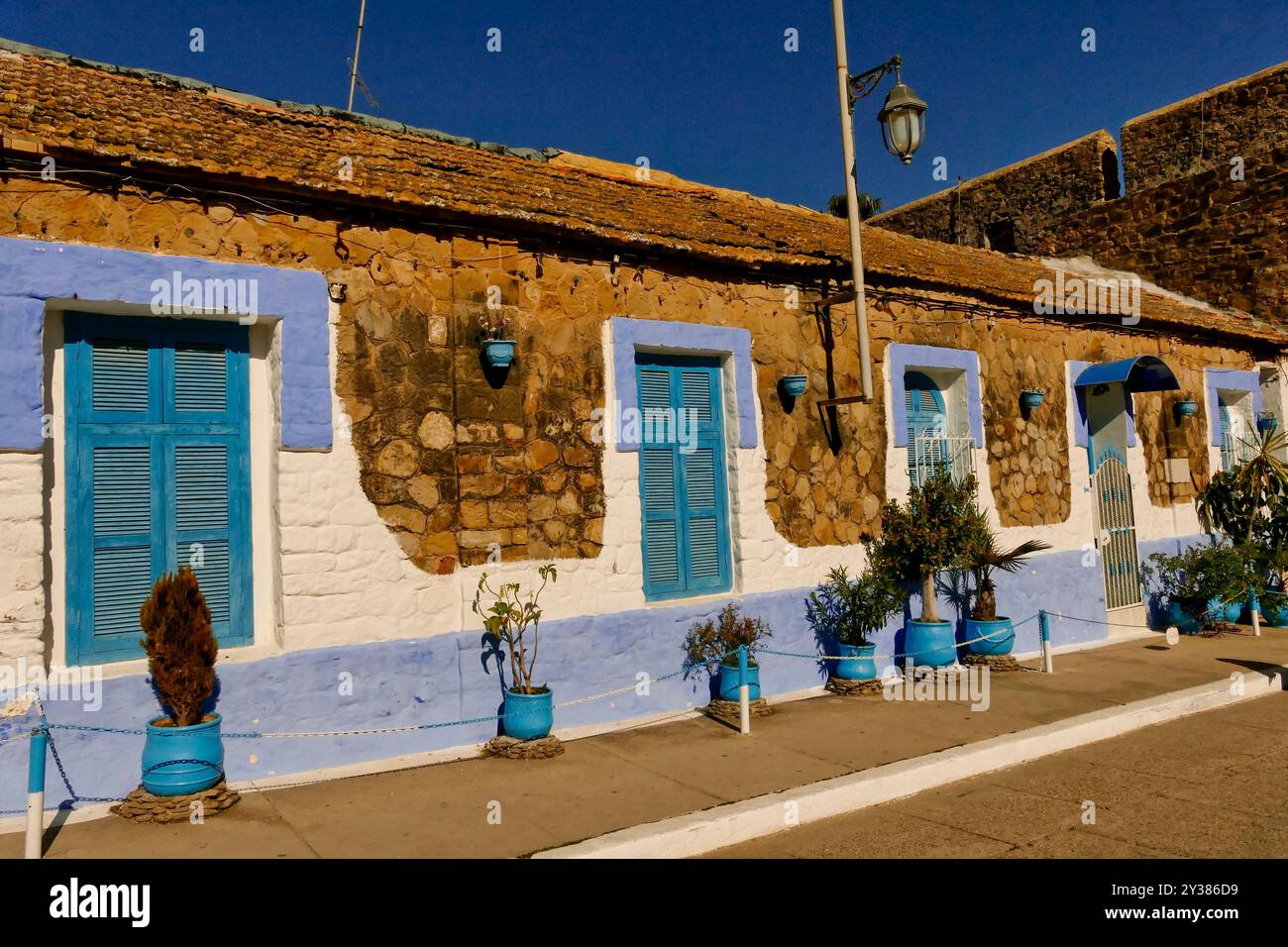 the fortified city of Asilah, on the northwestern tip of Morocco, 42 ...