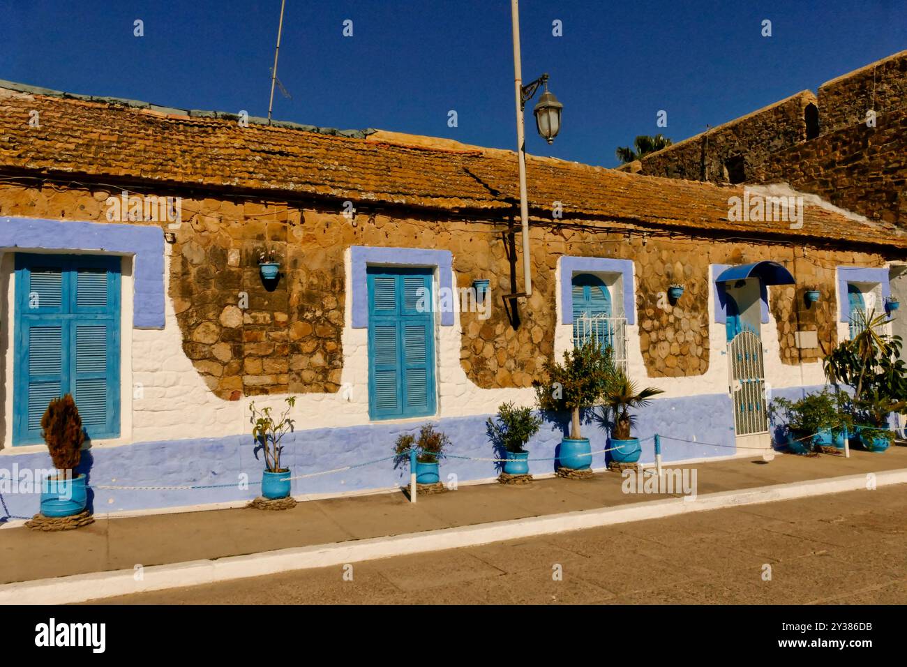 the fortified city of Asilah, on the northwestern tip of Morocco, 42 ...