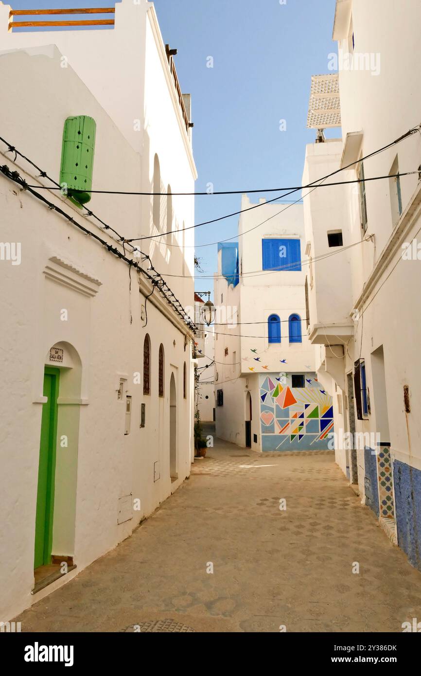 the fortified city of Asilah, on the northwestern tip of Morocco, 42 ...
