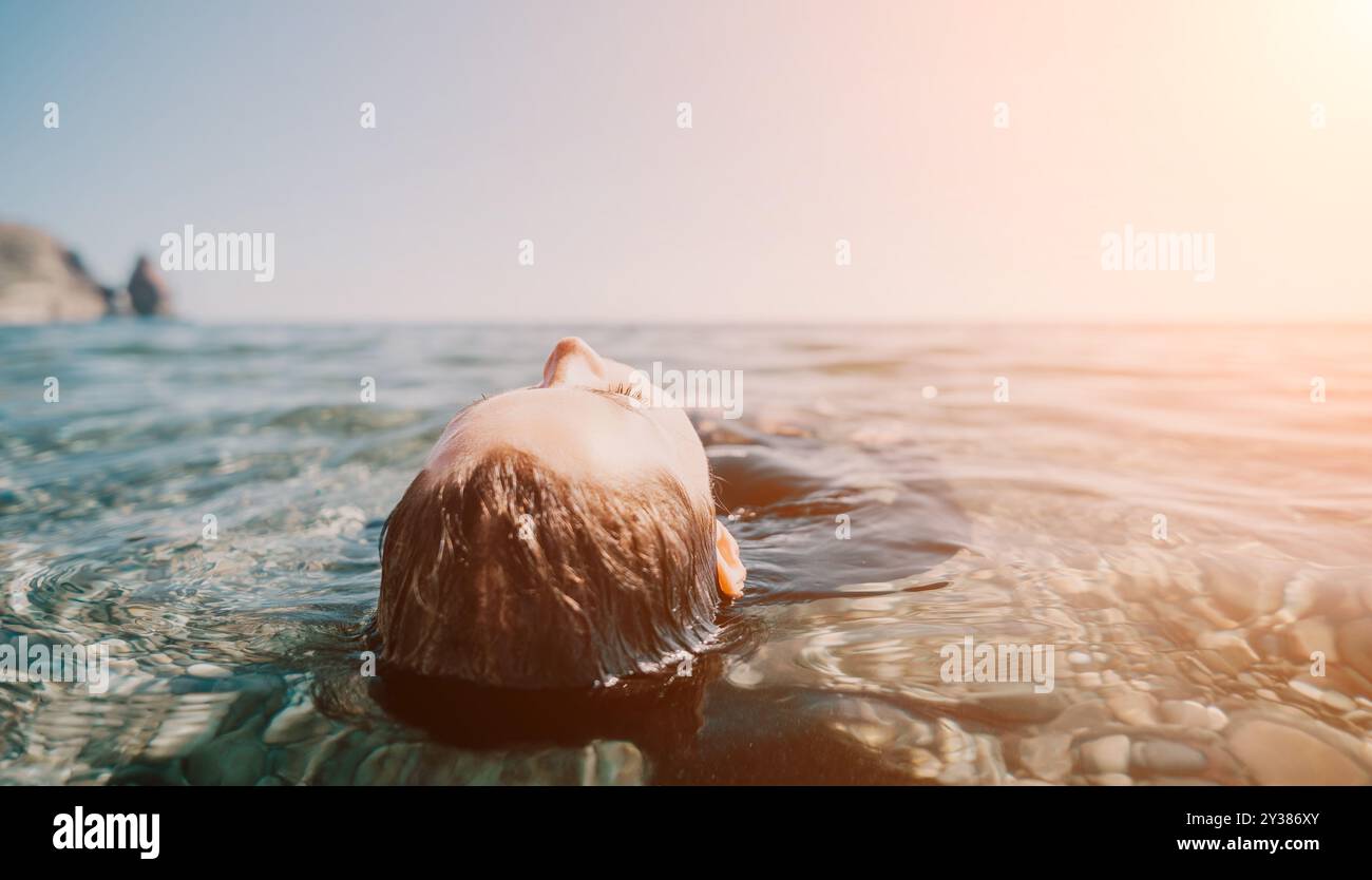 Slow motion closeup woman swimming hi-res stock photography and images ...