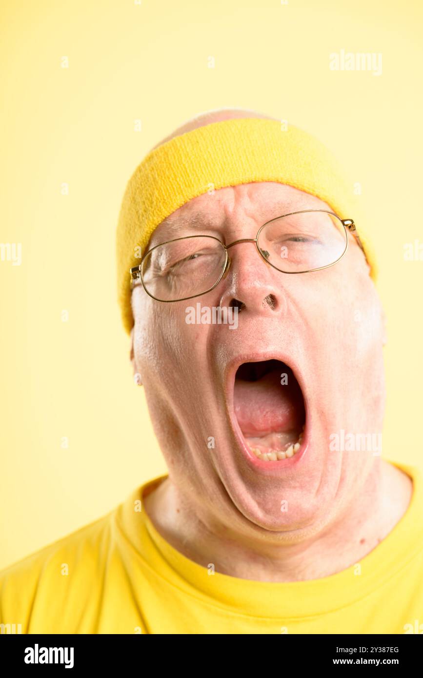 Studio, portrait and man with yawning for fitness, exercise workout and ...