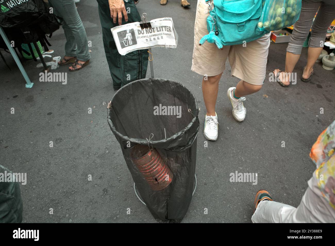 A trash bin that is placed on Gaya Street during Sunday Market in Kota ...