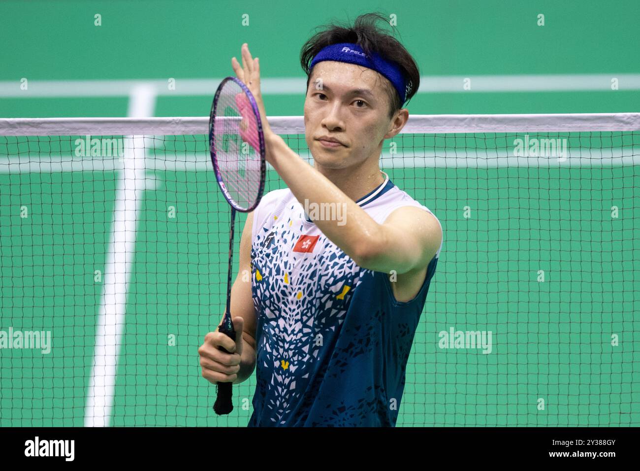 Ng Ka Long Angus of Hong Kong reacts during men single round 1 match of Li Ning Hong Kong Open ...
