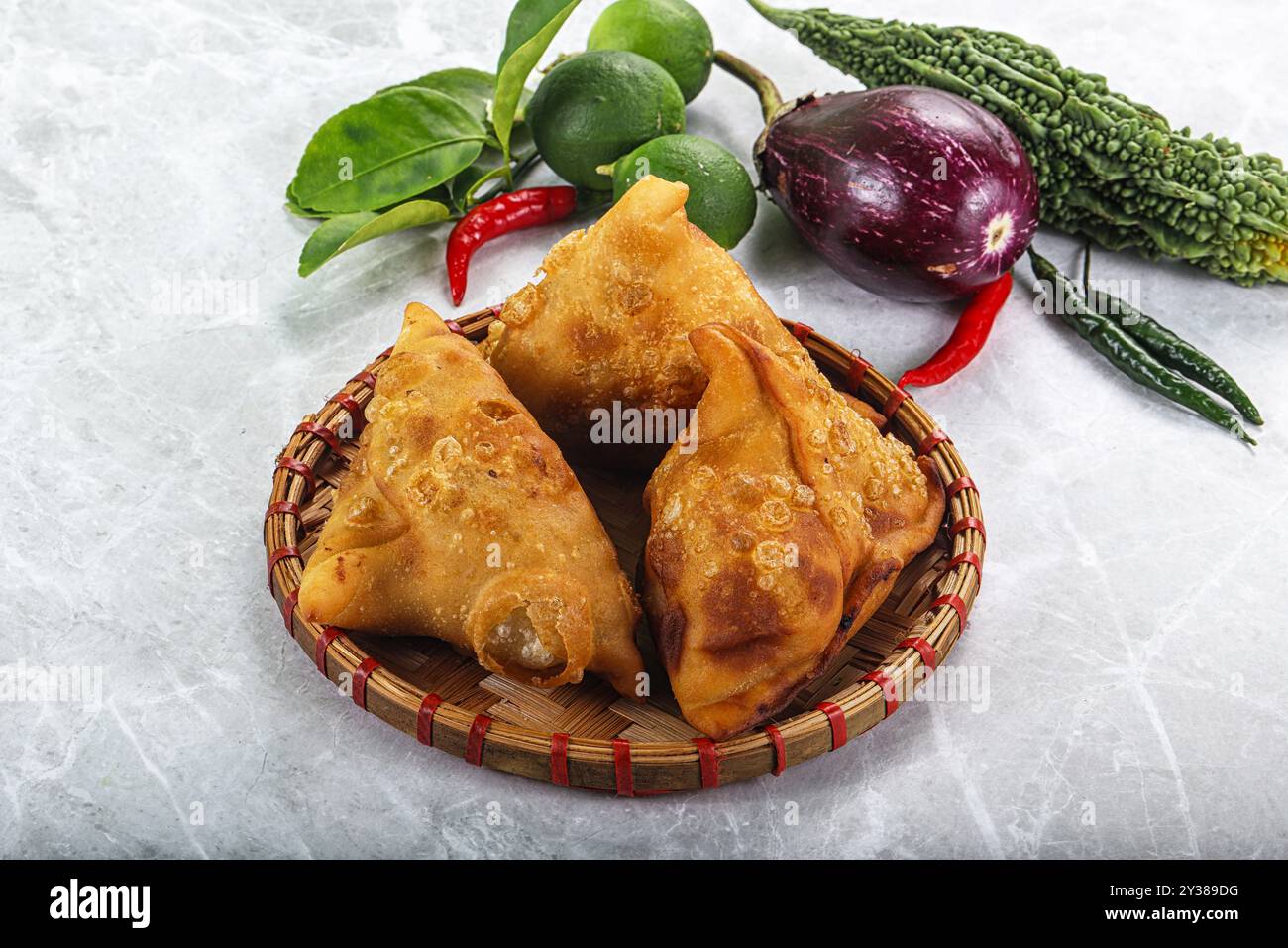 Indian cuisine - fries crispy stuffed samosa Stock Photo - Alamy