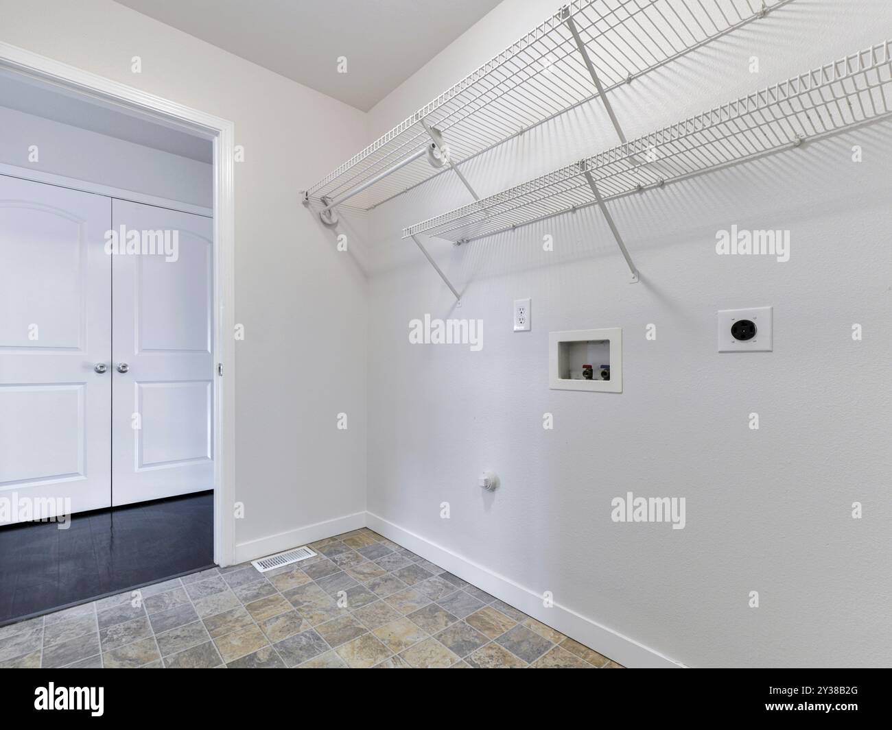 Modern residential empty laundry room interior Stock Photo - Alamy