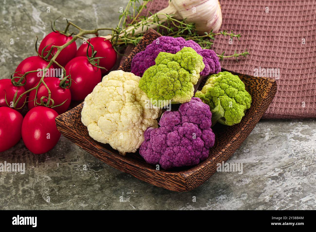 Raw cauliflower different colors heap served leaf Stock Photo - Alamy