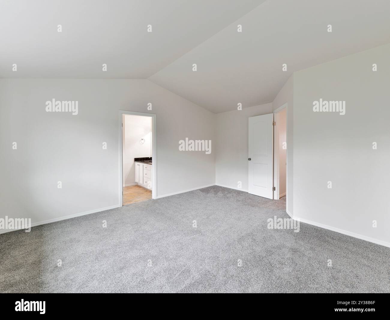 Modern residential empty bedroom interior Stock Photo - Alamy