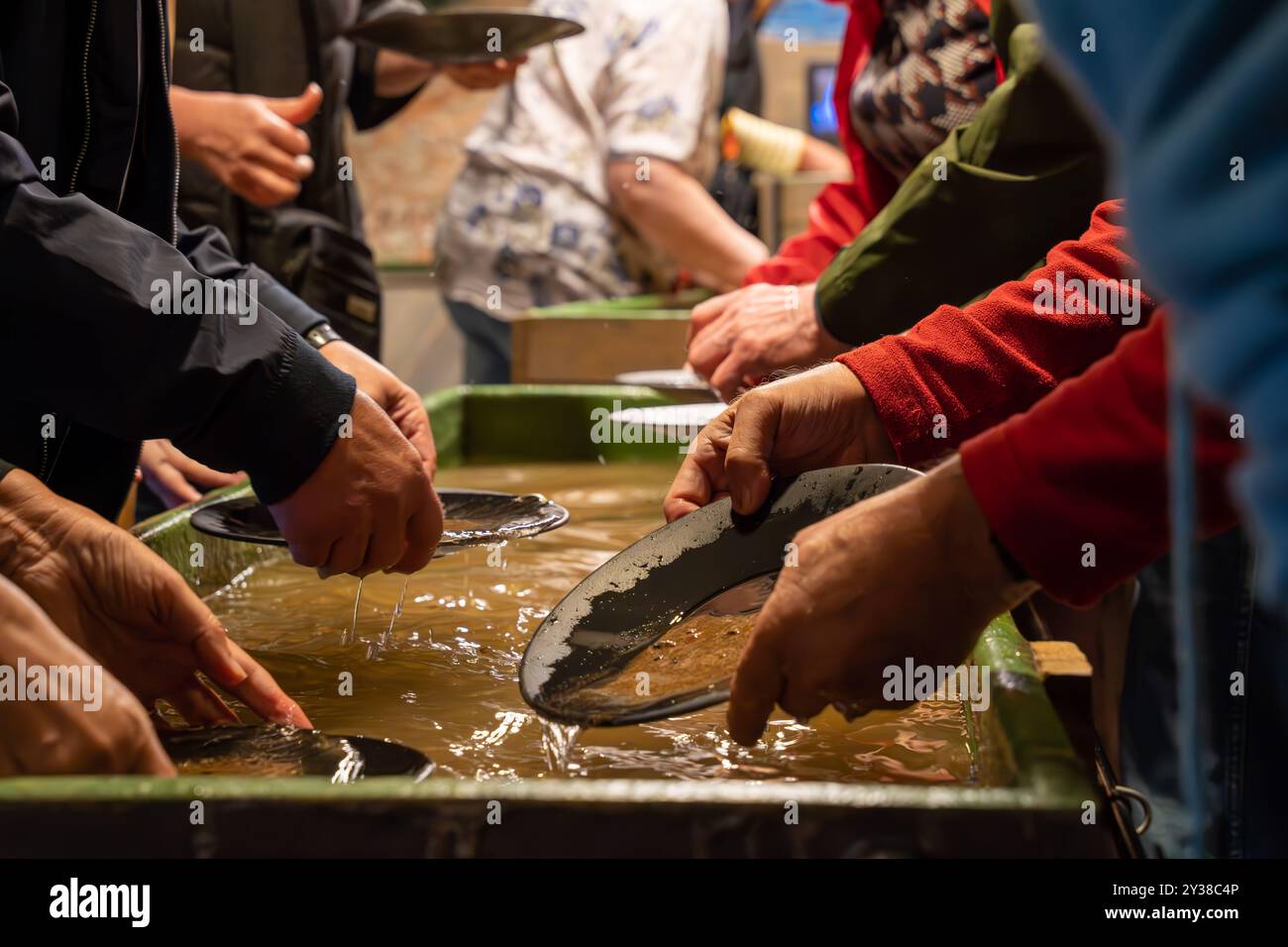 Tourists gold panning in Tankavaara Gold Village in Finland Stock Photo ...