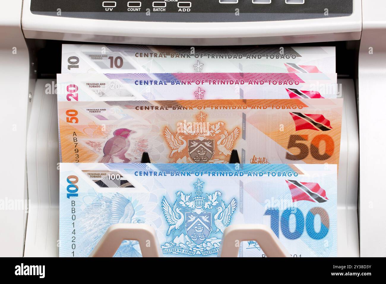 Trinidad and Tobago money - dollar in the counting machine Stock Photo ...
