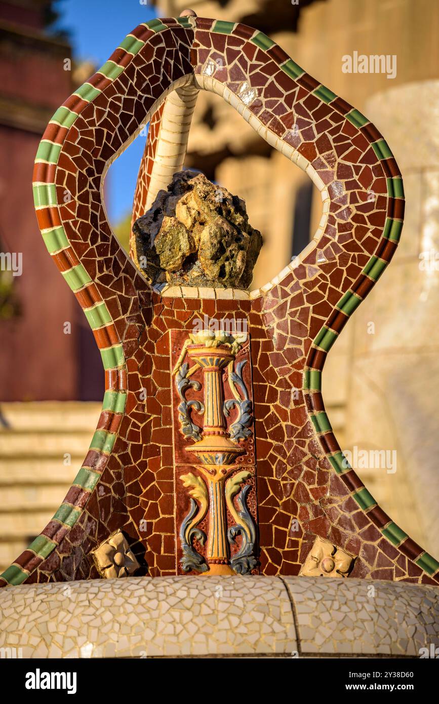 Sculpture with 'trencadís' on the dragon staircase, the entrance gate ...