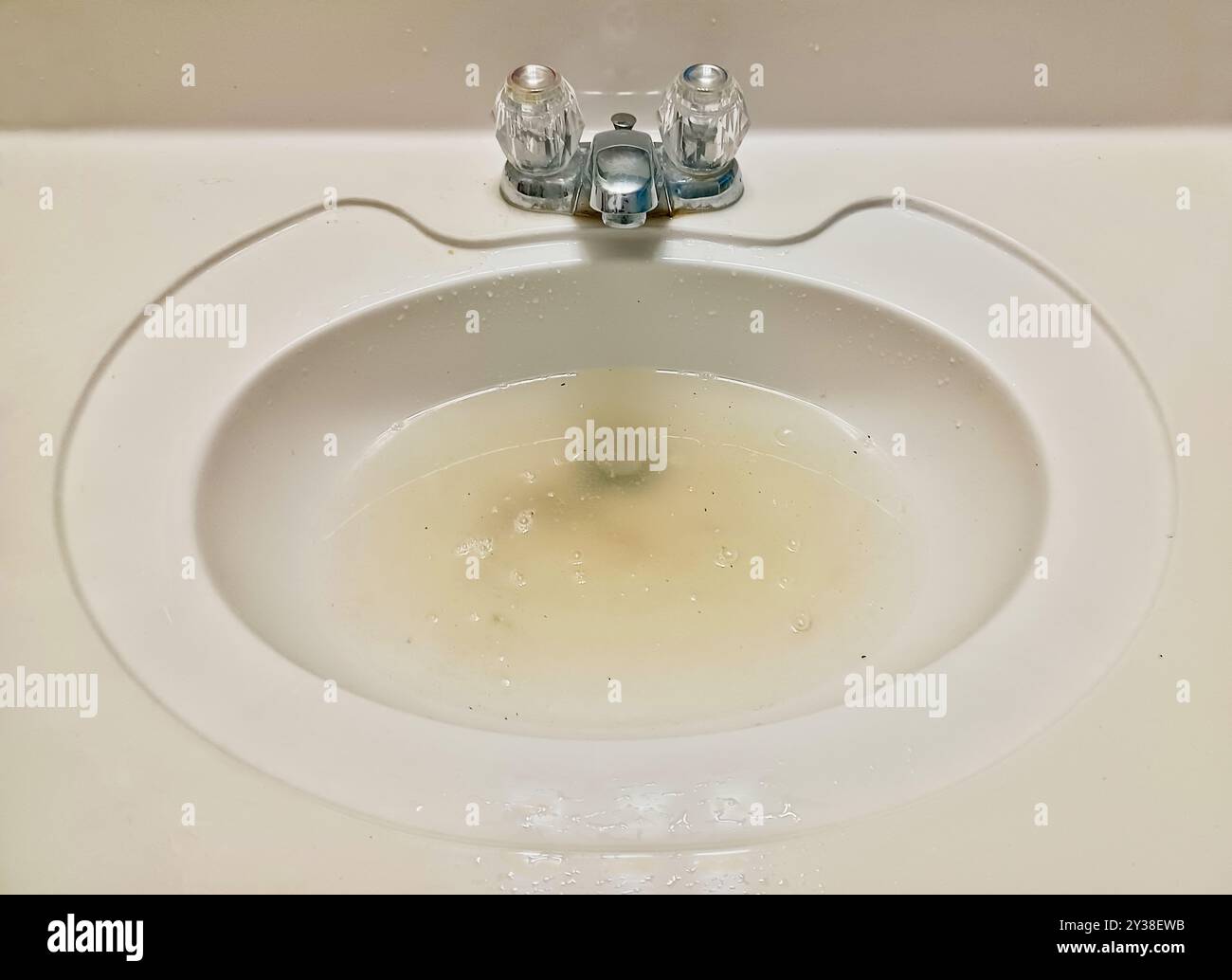 Bathroom sink blocked drain plumbing problems dirty water vanity ...