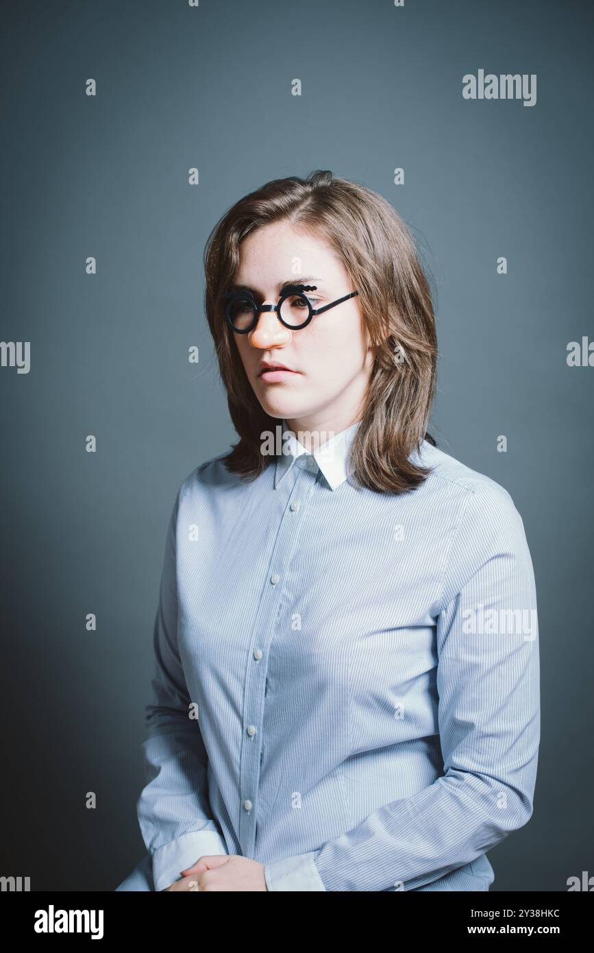 Woman, thinking and fake glasses for mask, cosplay and halloween photo ...