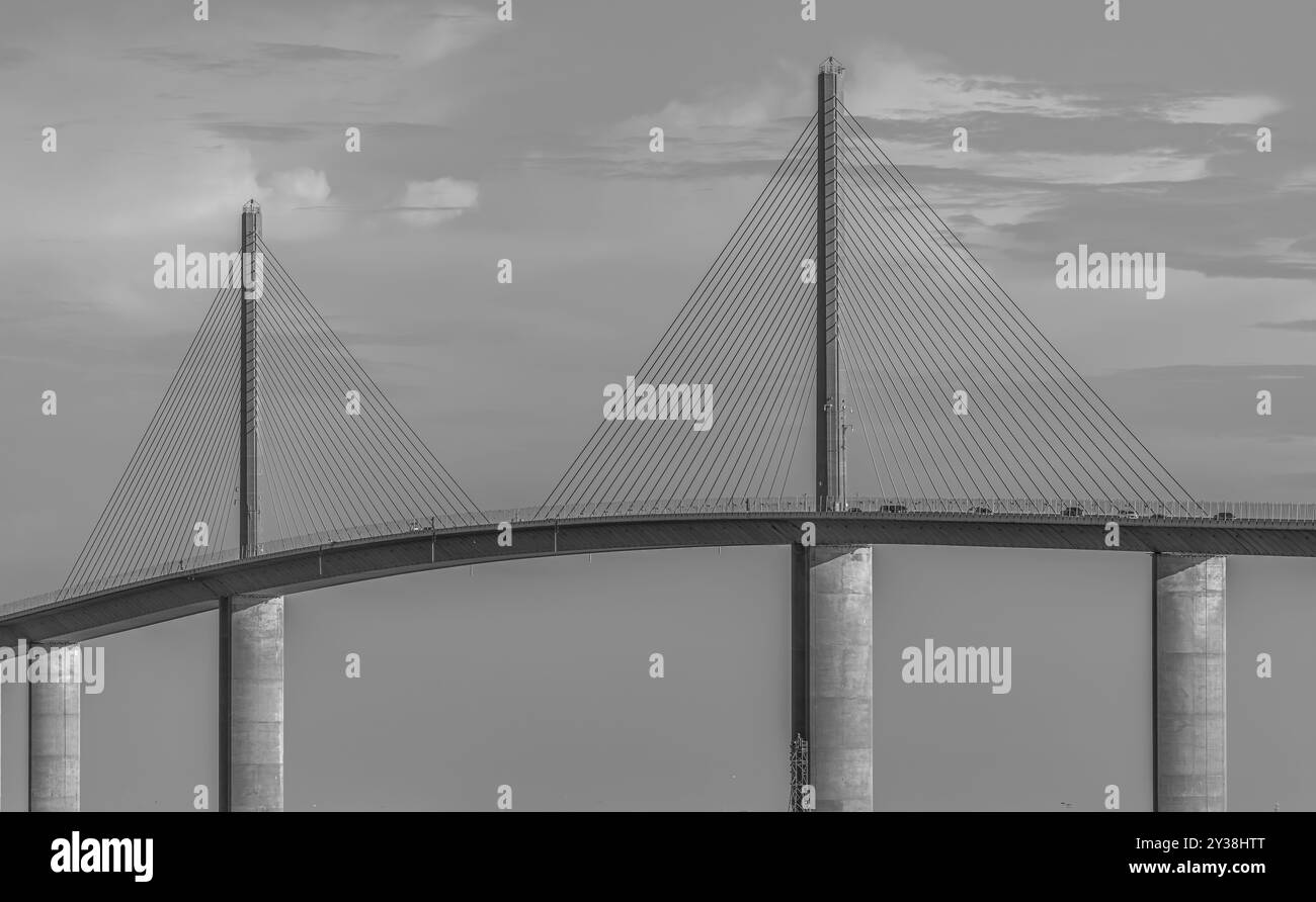 Black and white image of a cable-stayed bridge with clear sky ...