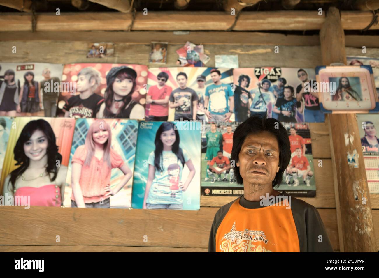 Portrait of Umbu Tiu, a Sumbanese family man outside his traditional ...