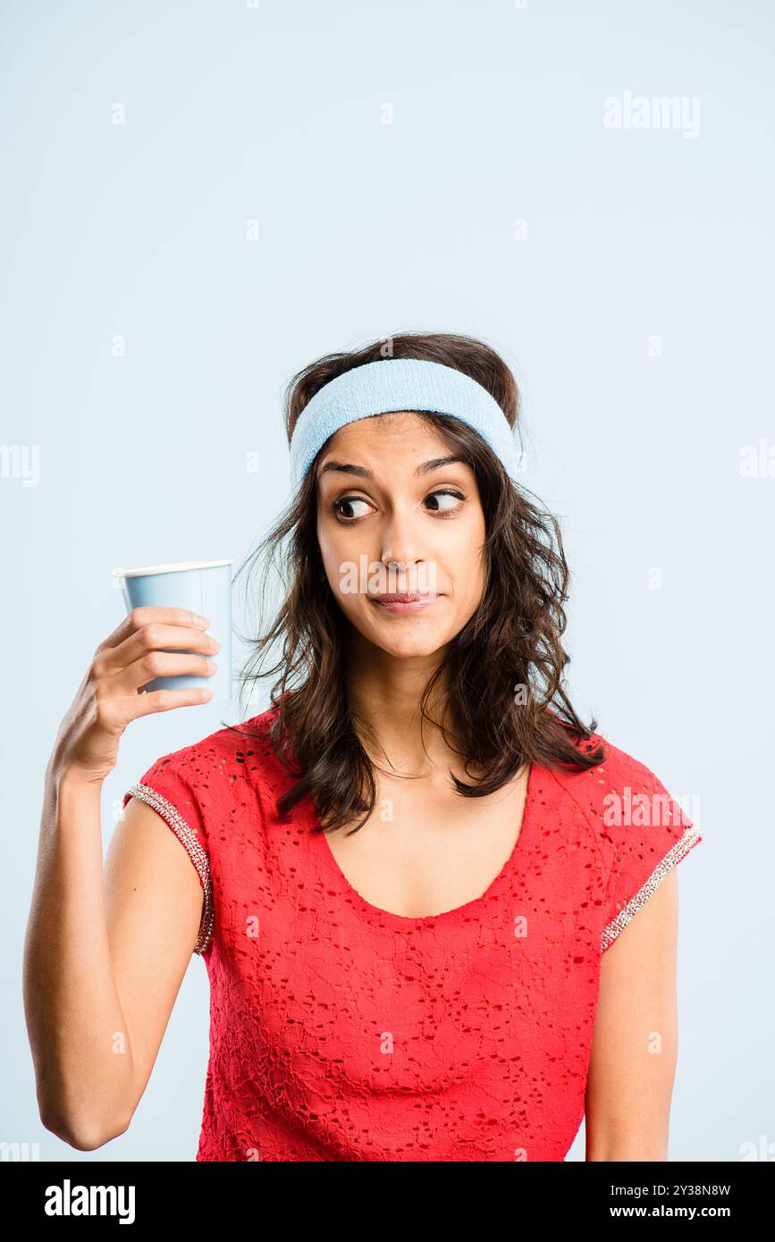 Surprise, woman and headband for fashion in studio with retro fitness ...