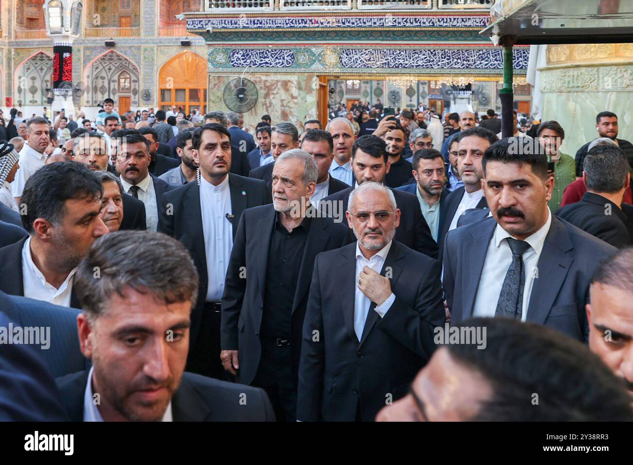 Najaf, Iraq. 12th Sep, 2024. Iranian President MASOUD PEZESHKIAN (C ...