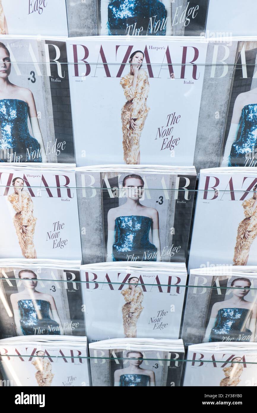 Harper's Bazaar magazines in a newspaper stand in the center of Milan ...