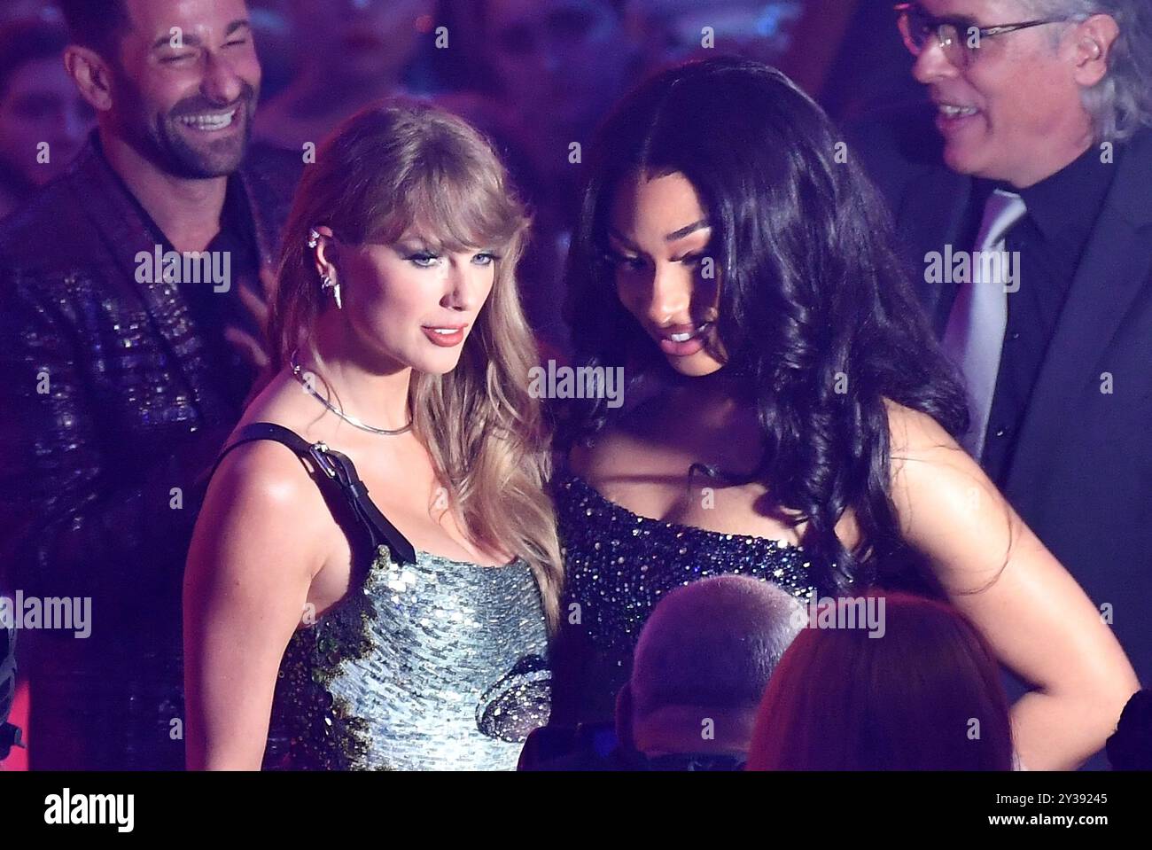 Elmont, USA. 11th Sep, 2024. Taylor Swift and Megan Thee Stallion pose ...