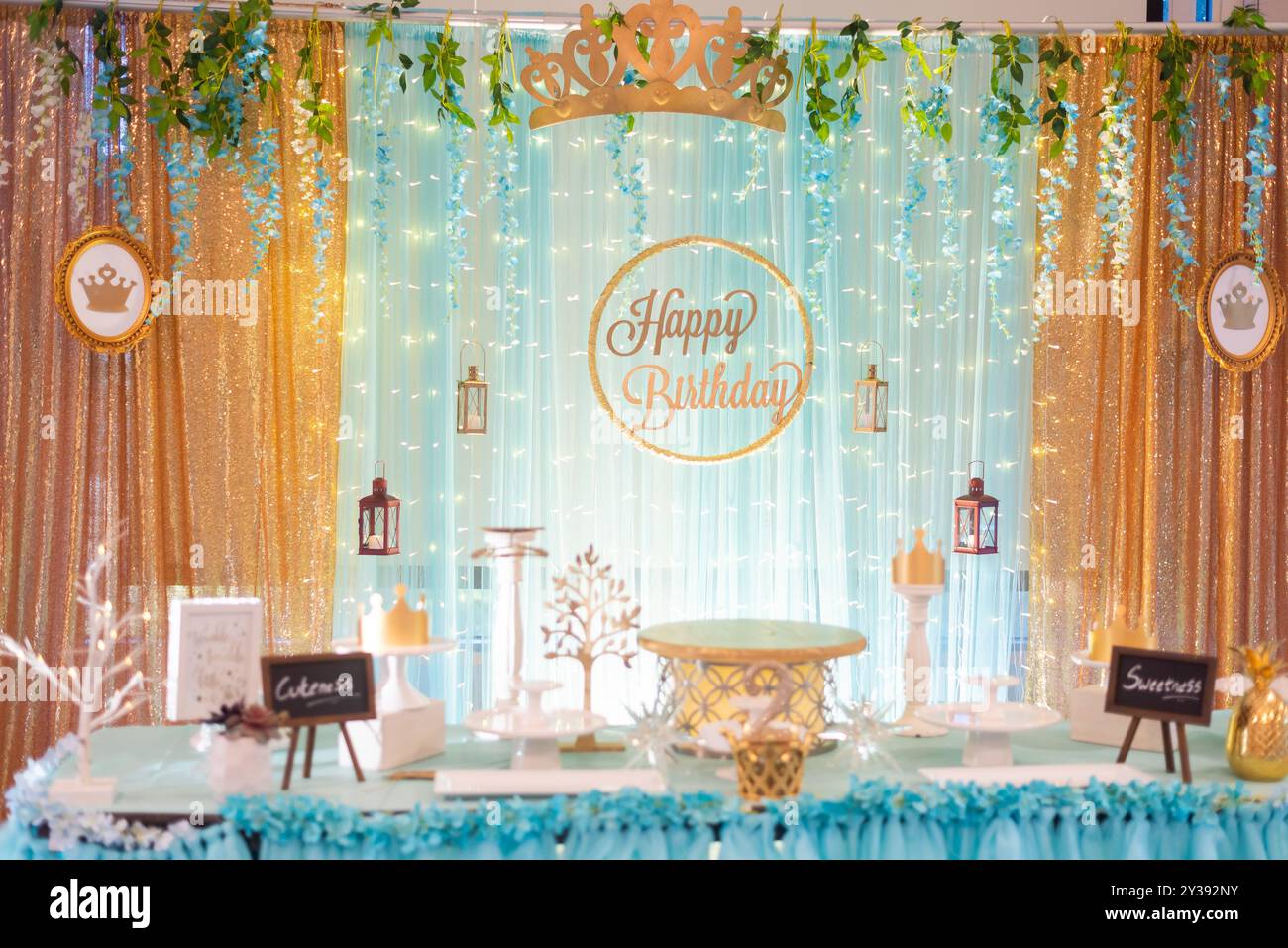 Elegant birthday setup with teal and gold accents Stock Photo - Alamy