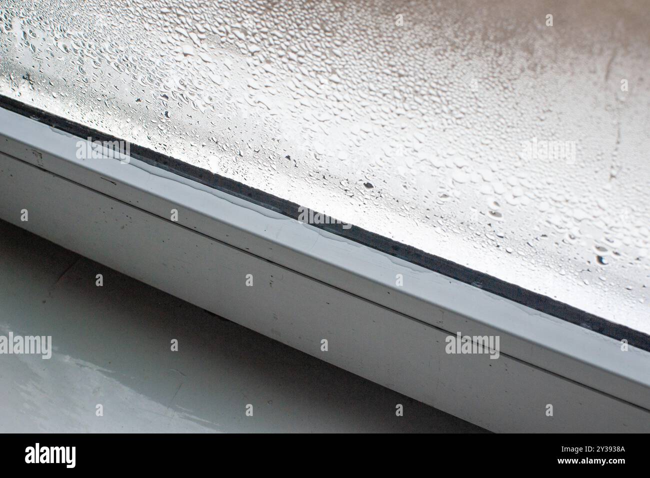 water flows down from the window glass Stock Photo - Alamy