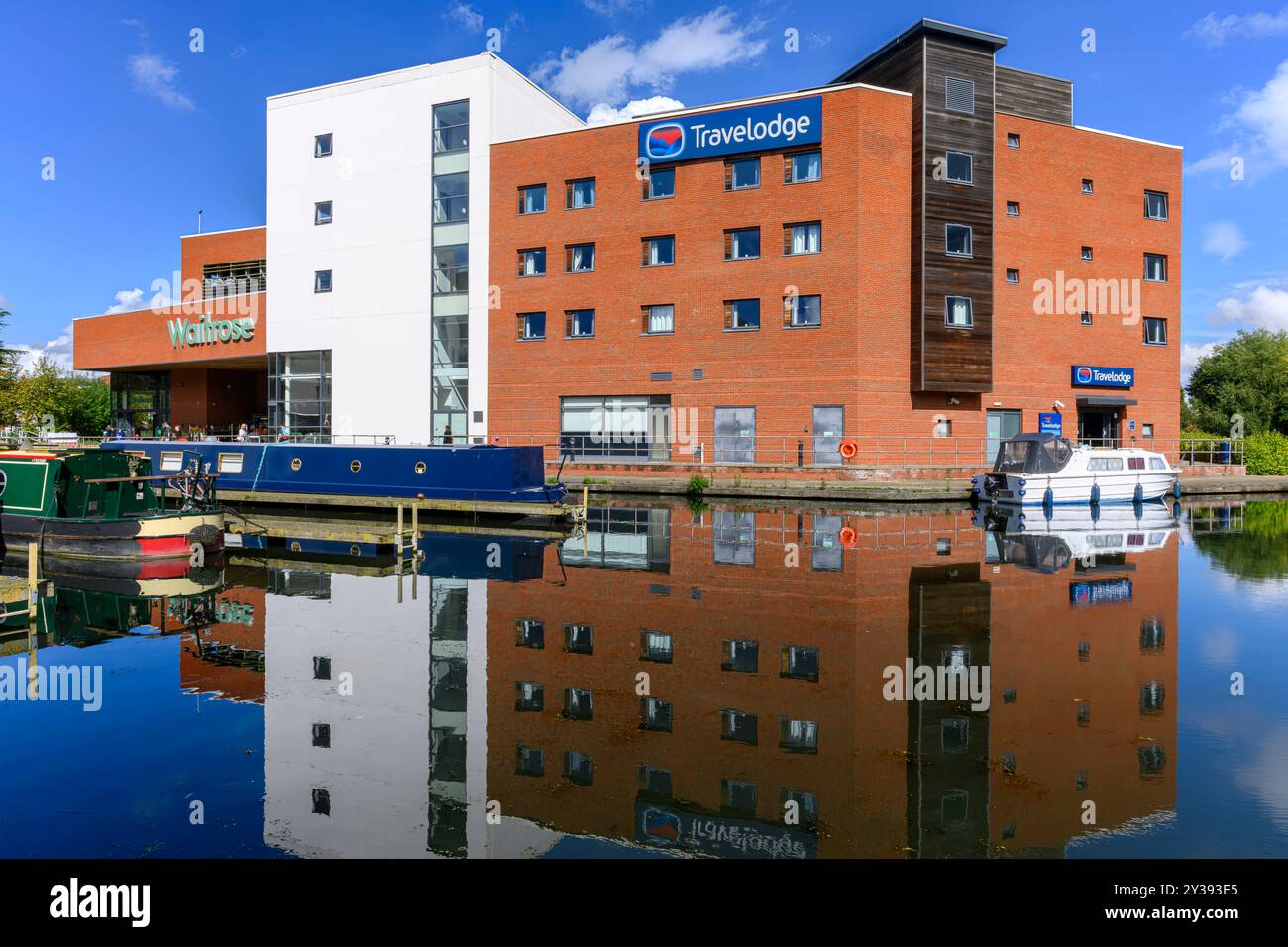 Grand Union Canal in Aylesbury Basin, reflecting the Waitrose ...