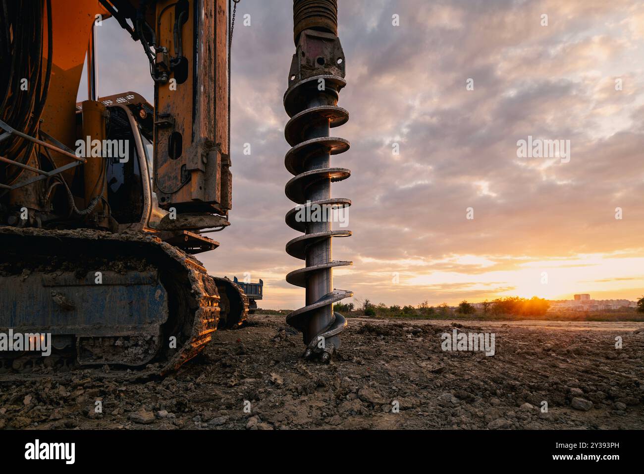 Building activity on construction site. Close-up view of heavy drilling ...