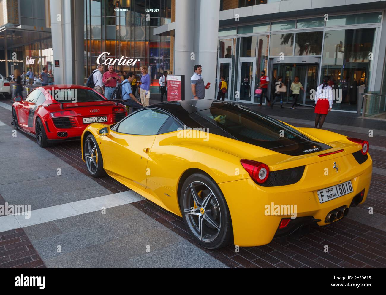 Yellow and red sport cars in a hotel of Dubai, United Arab Emirates ...