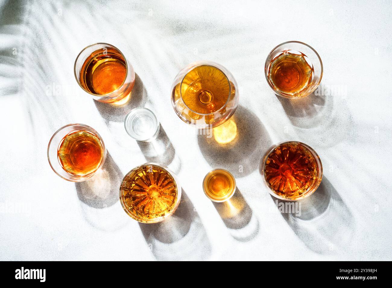 Strong alcohol drink. Whisky, rum, tequila, cognac at white background ...