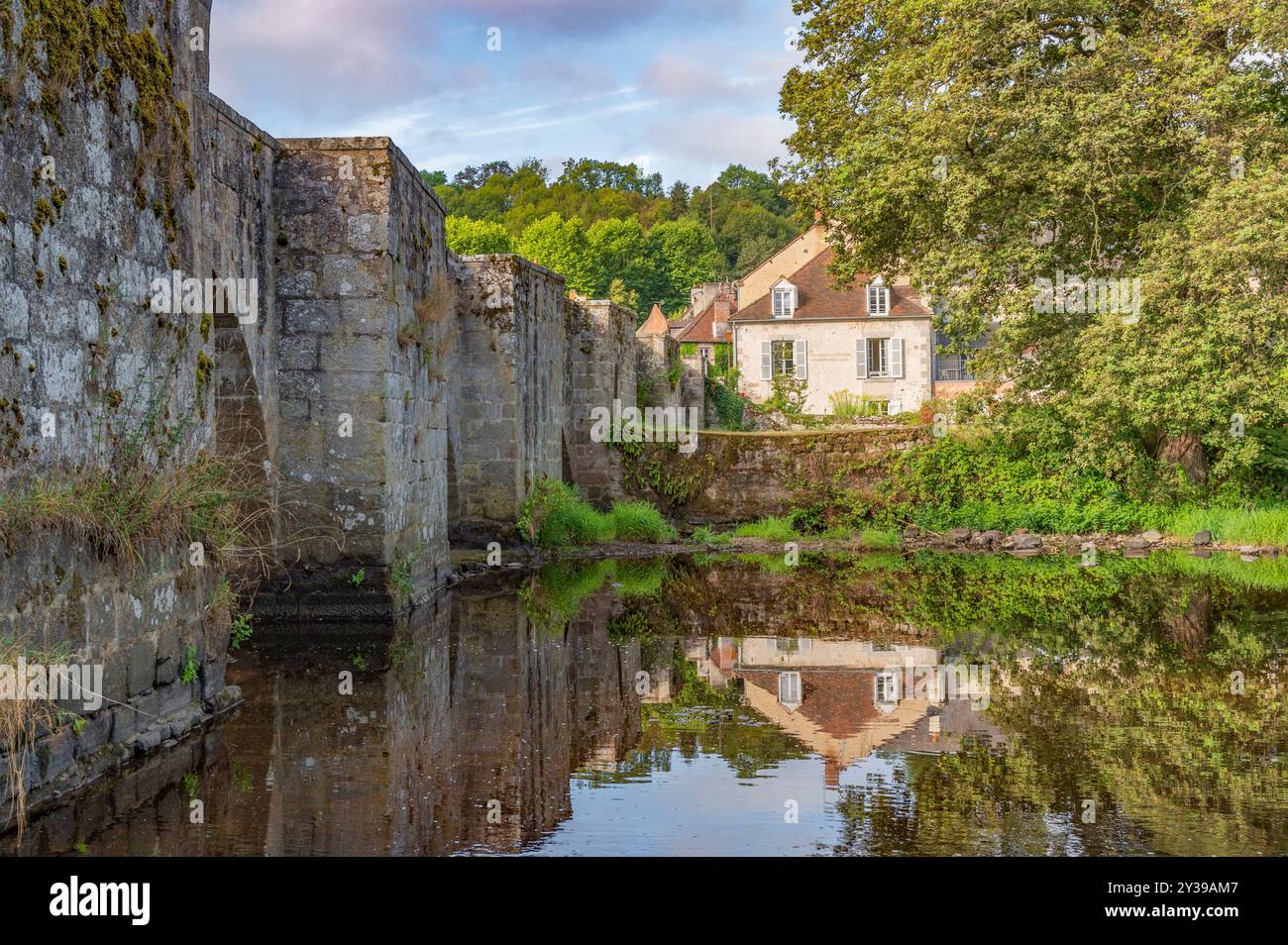 The Romanesque bridge crossing the Creuse river at Moutier-d'Ahun, Creuse departement, France ...
